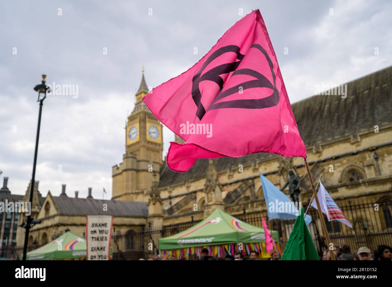 LONDON - April 22, 2023: The symbolism as XR flags fly above protesters ...