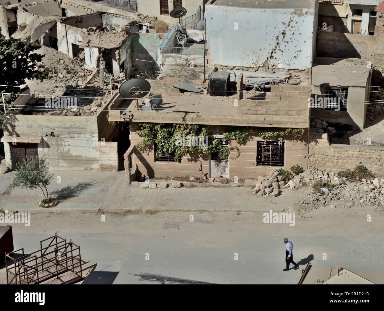 Old man walking on the streets of postwar Maaloula, Syria Stock Photo ...