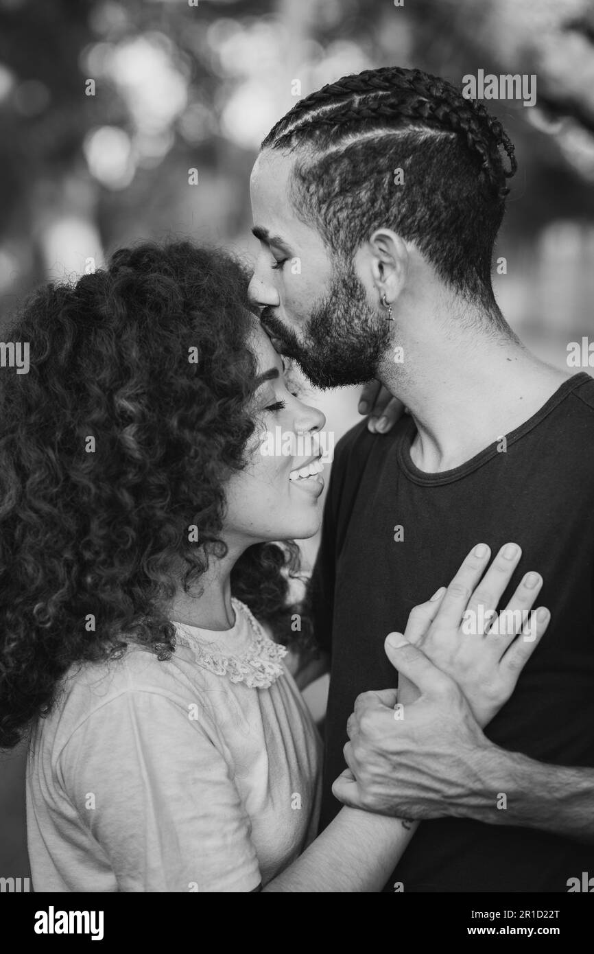 Black valentine couple in the park in love. Passionate couple of lovers ...