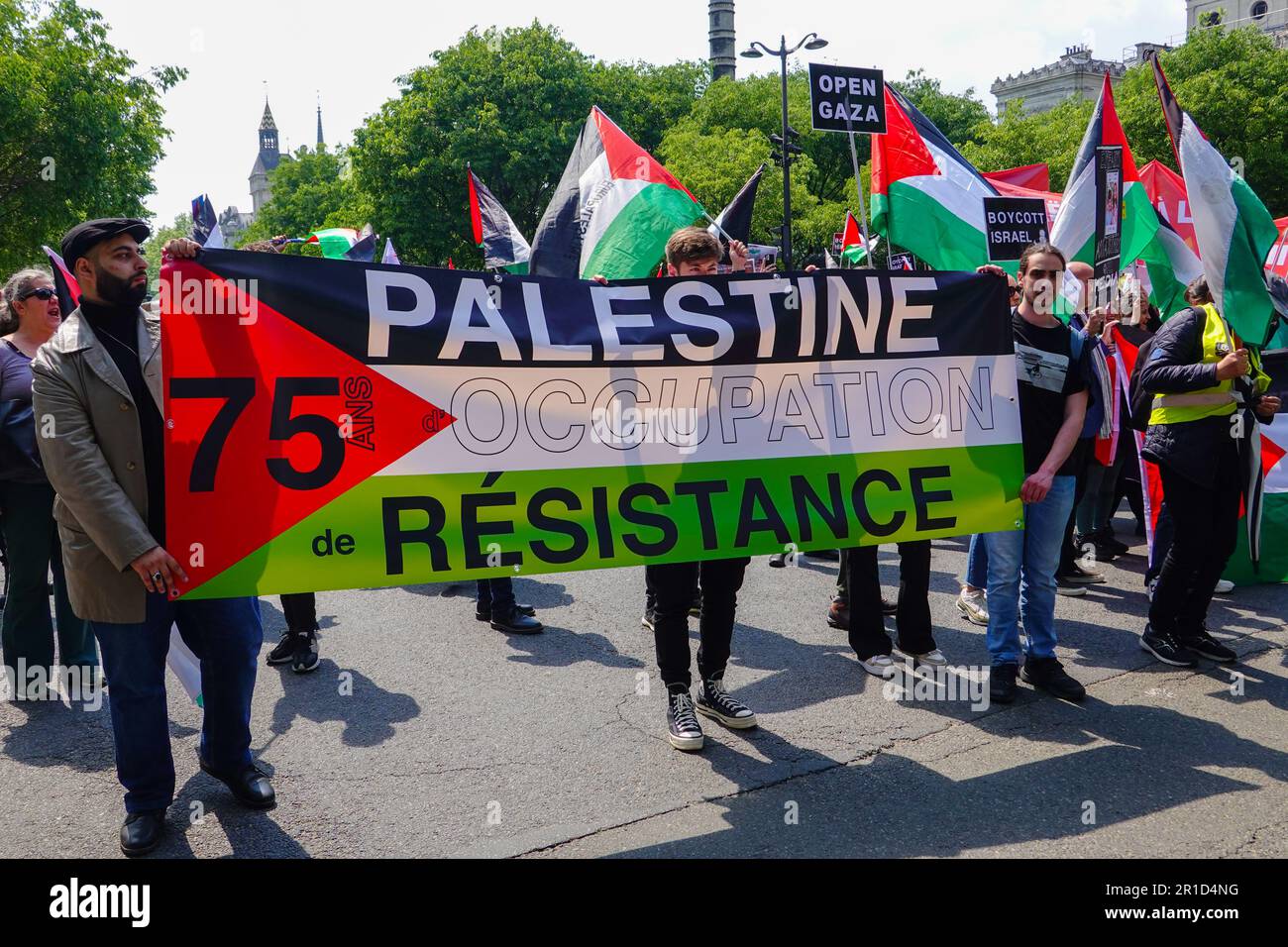 Paris, France. 13 May 2023. People March with signs proclaiming Justice ...