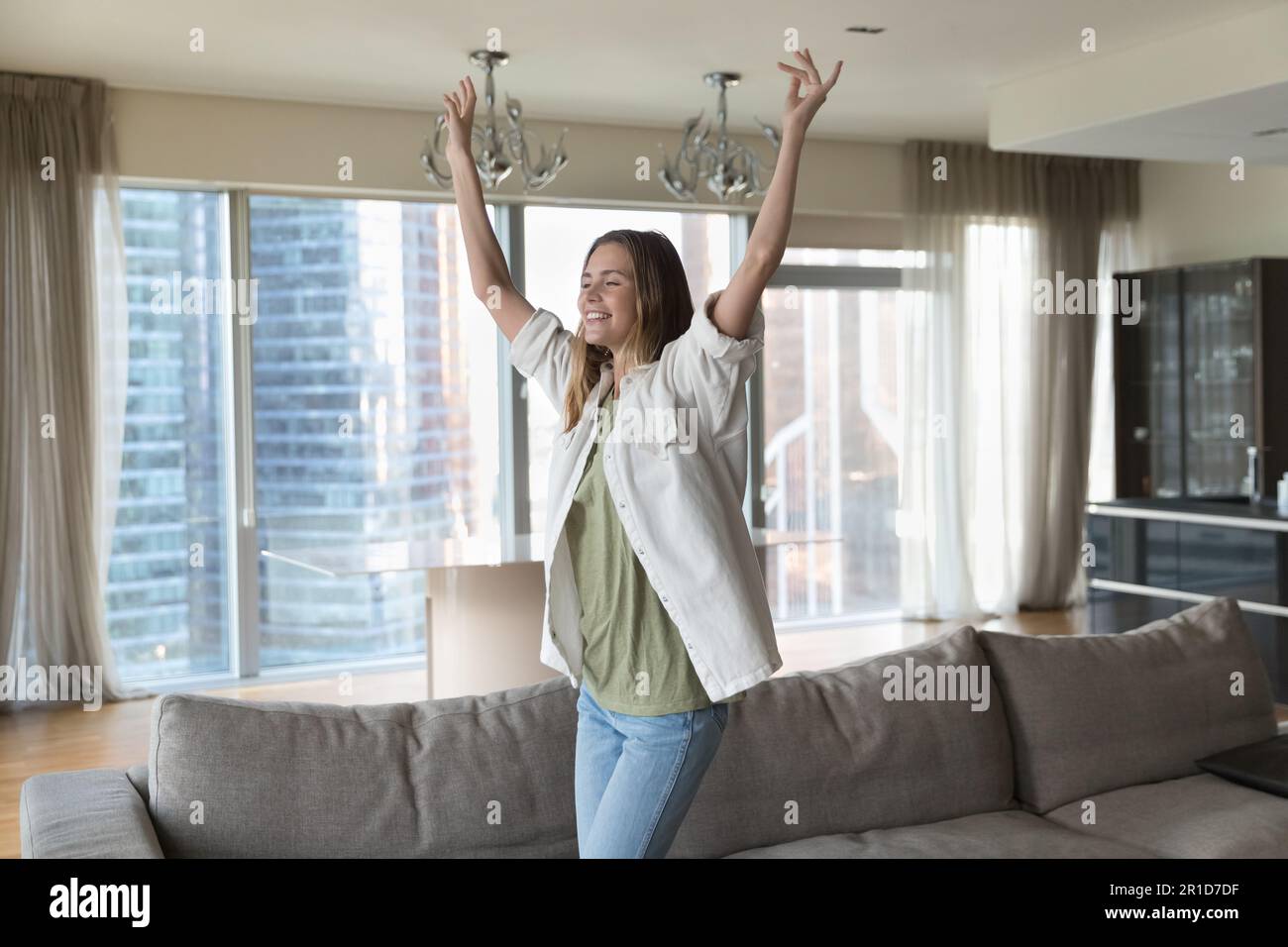 Happy positive dancer girl enjoying music, movement, exercising Stock ...