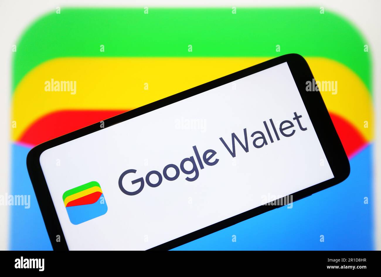 In this photo illustration, a Google Wallet logo is seen on a ...