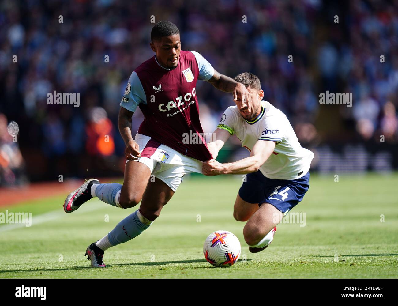 Tottenham Hotspur's Clement Lenglet pulls back Aston Villa's Leon ...