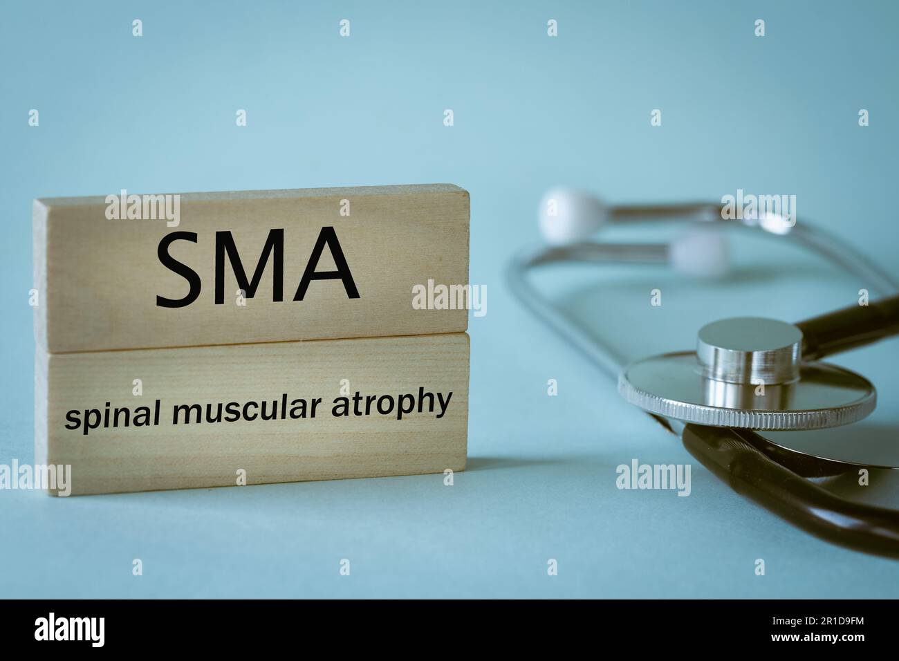 SMA Rare disease abbreviation Spinal Muscular Atrophy written on wooden ...