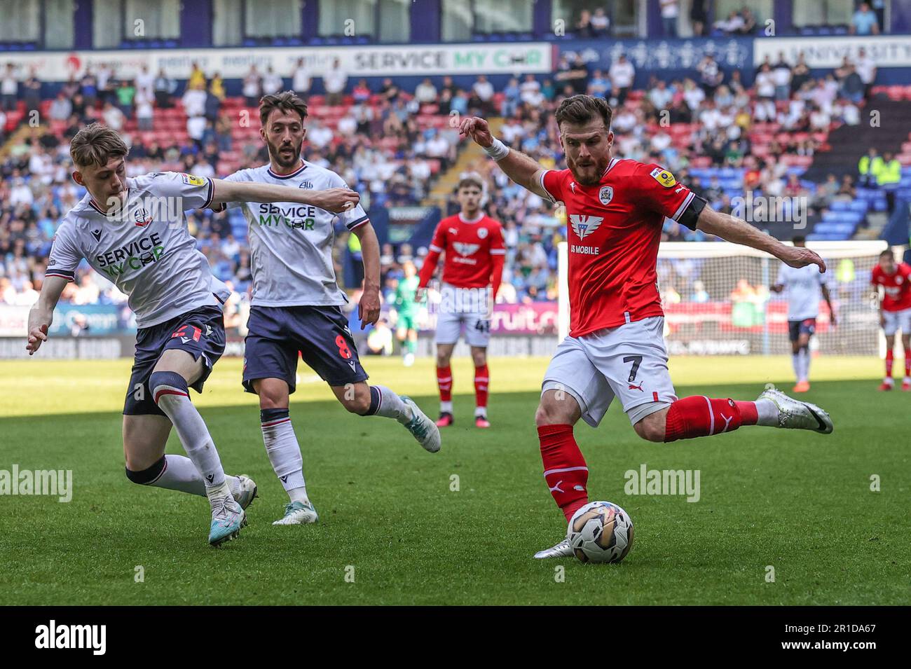 Nicky Cadden #7 of Barnsley crosses the ball during the Sky Bet League ...