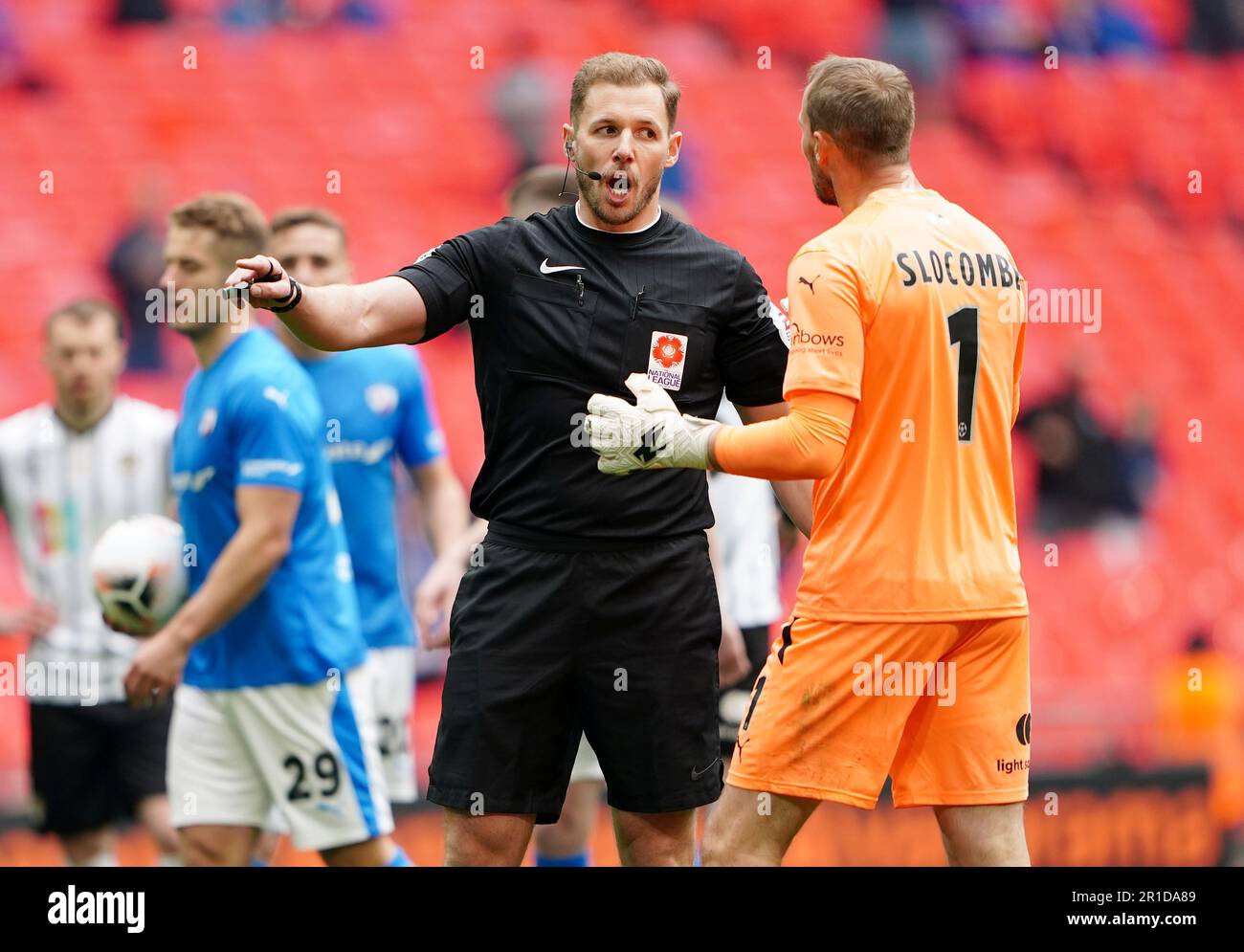 Notts County goalkeeper Sam Slocombe appeals to referee Matt Corlett ...