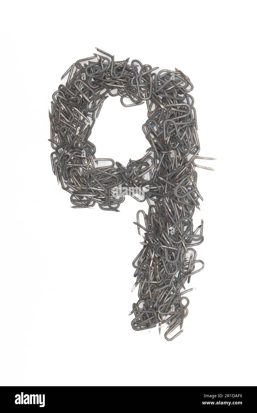 artistic number nine 9 made from steel staples isolated on a white ...