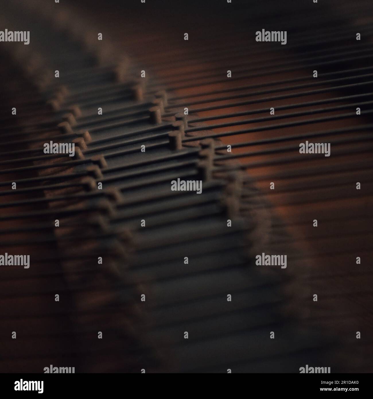 A black grand piano with ivory vintage keys in a row Stock Photo - Alamy