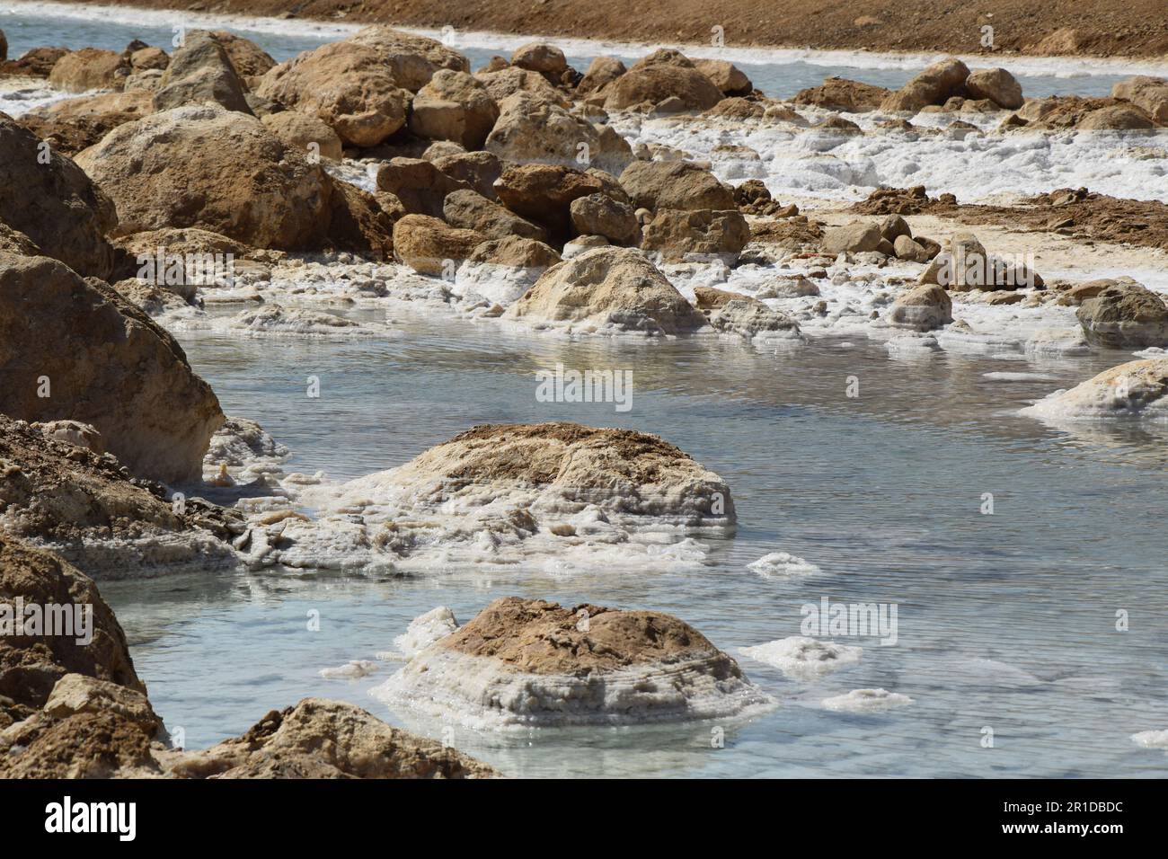 Sinking sea level, sinkholes and salt crystals - Coast of the Dead Sea ...