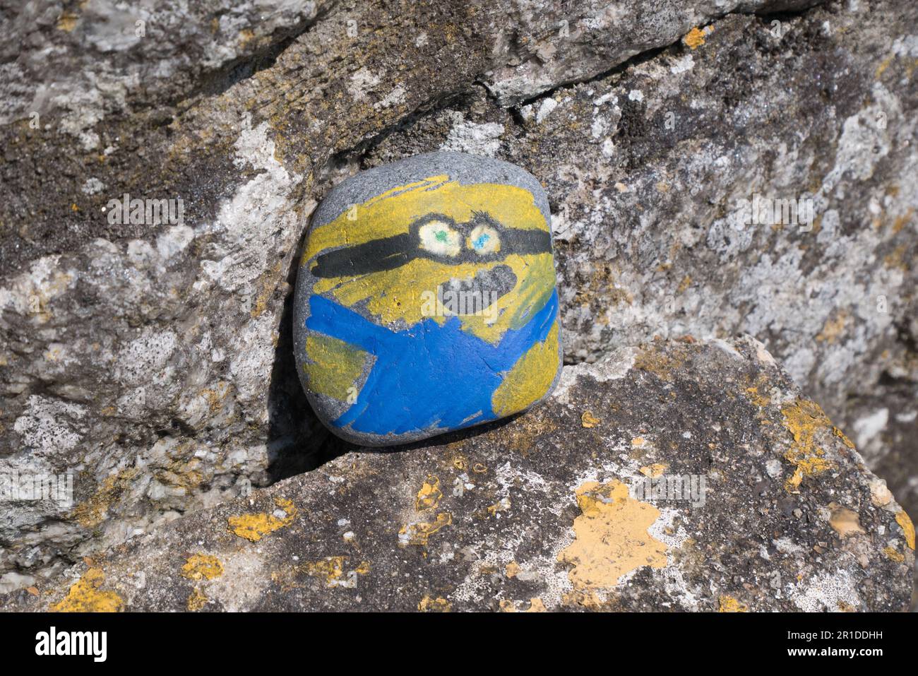 Pained stone face Stock Photo - Alamy