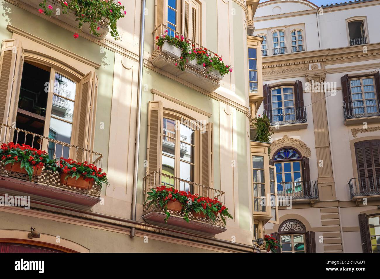 Building with flower window boxes - Malaga, Andalusia, Spain Stock ...