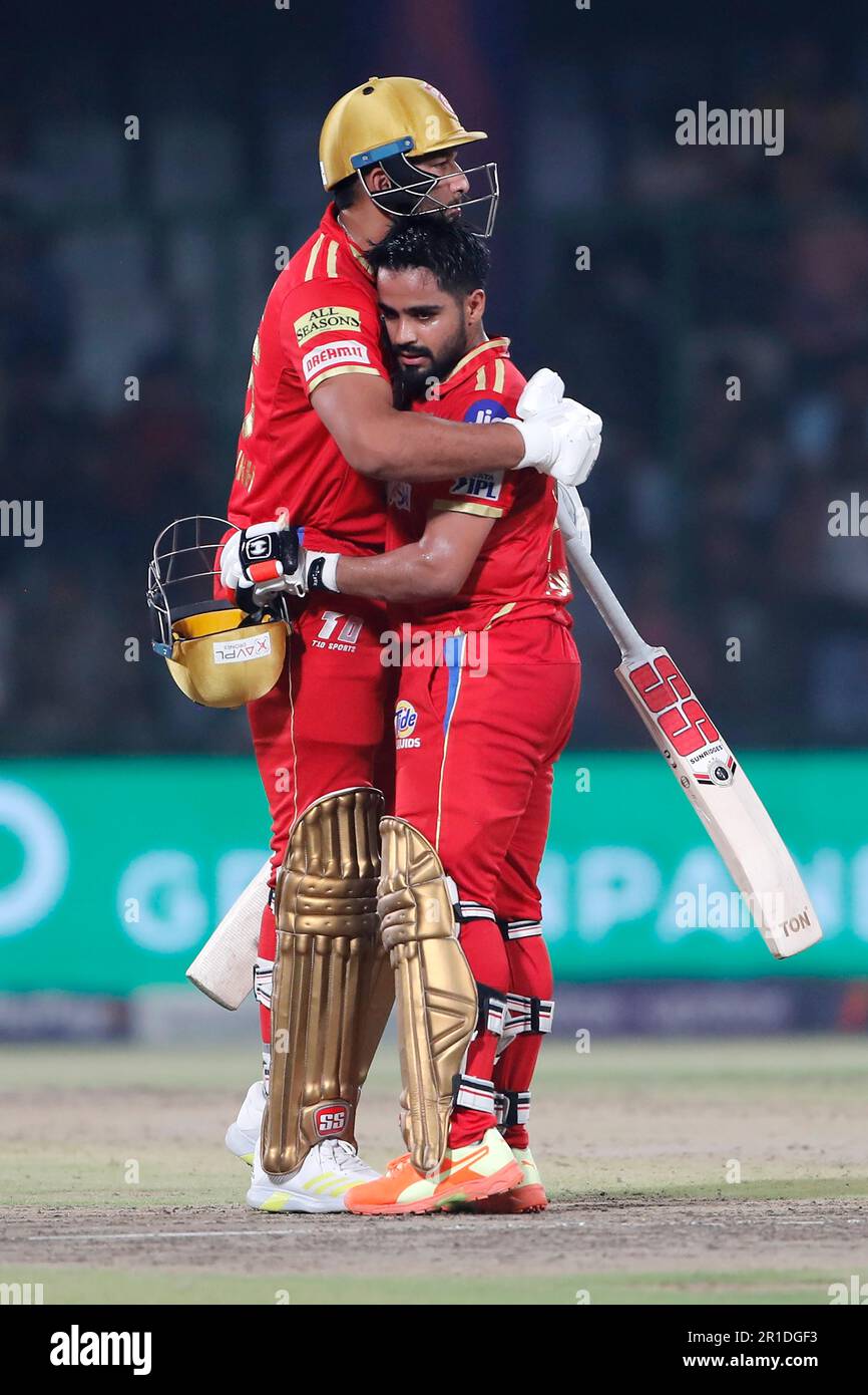 Punjab Kings' Prabhsimran Singh, right, celebrates his century with ...