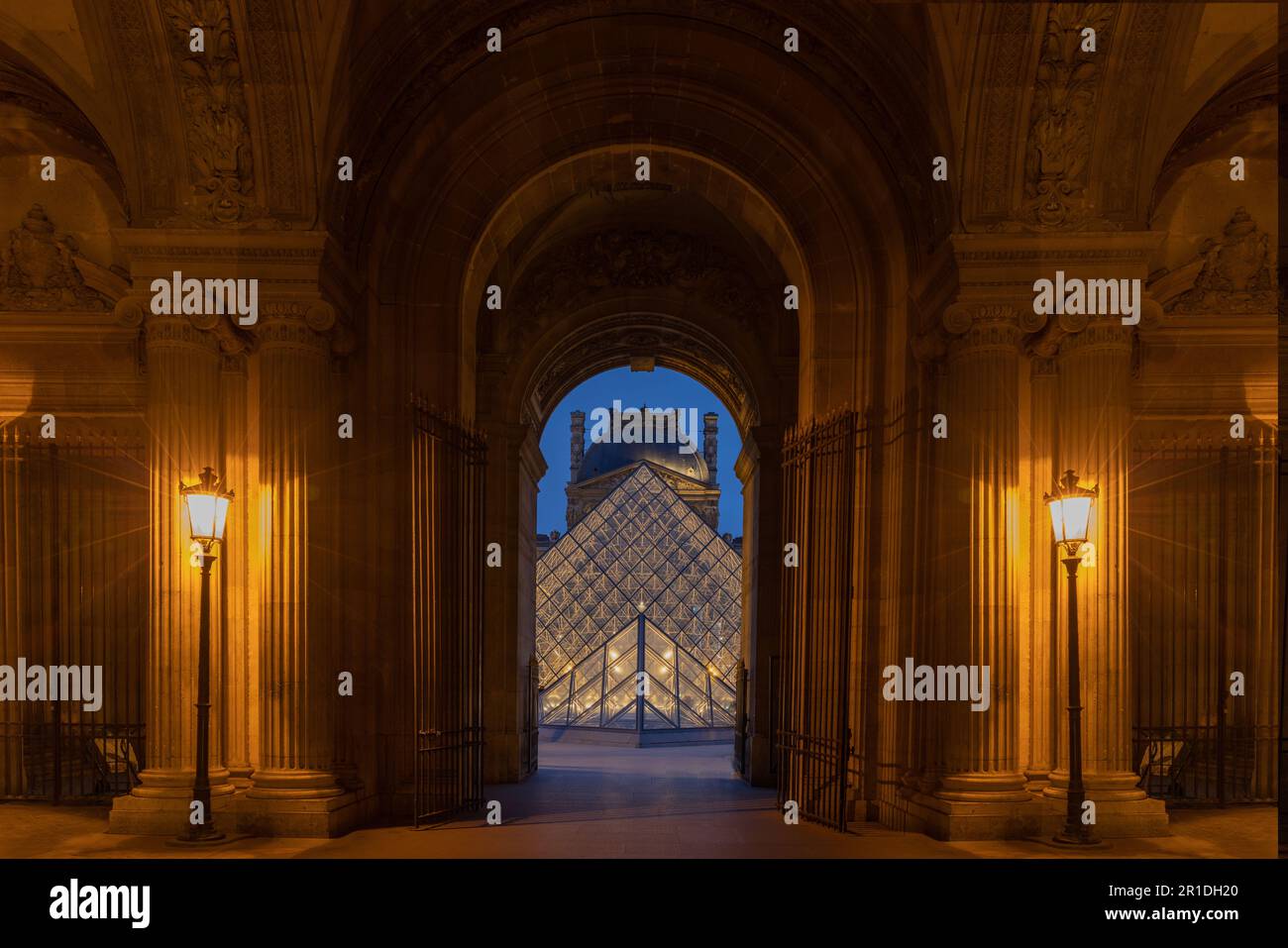 The Louvre in Paris, France. Glass Pyramids at night in the famous ...