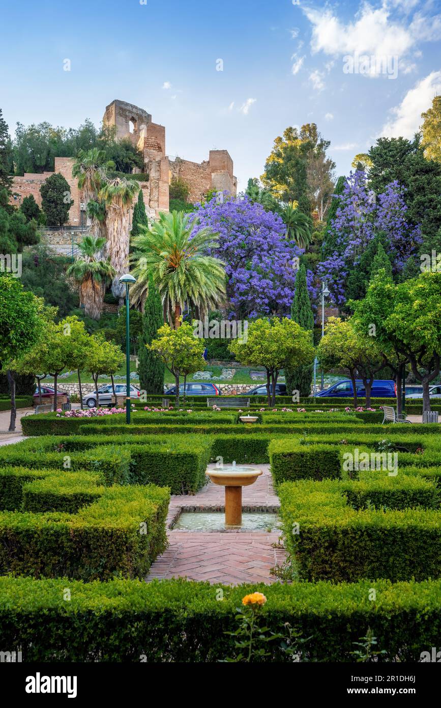 Pedro Luis Alonso Gardens with Alcazaba Fortress - Malaga, Andalusia ...