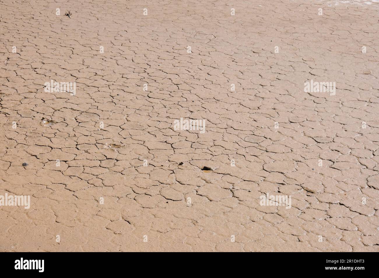 Drought, ground cracks, no hot water. Dry land in the dry season. Lack ...