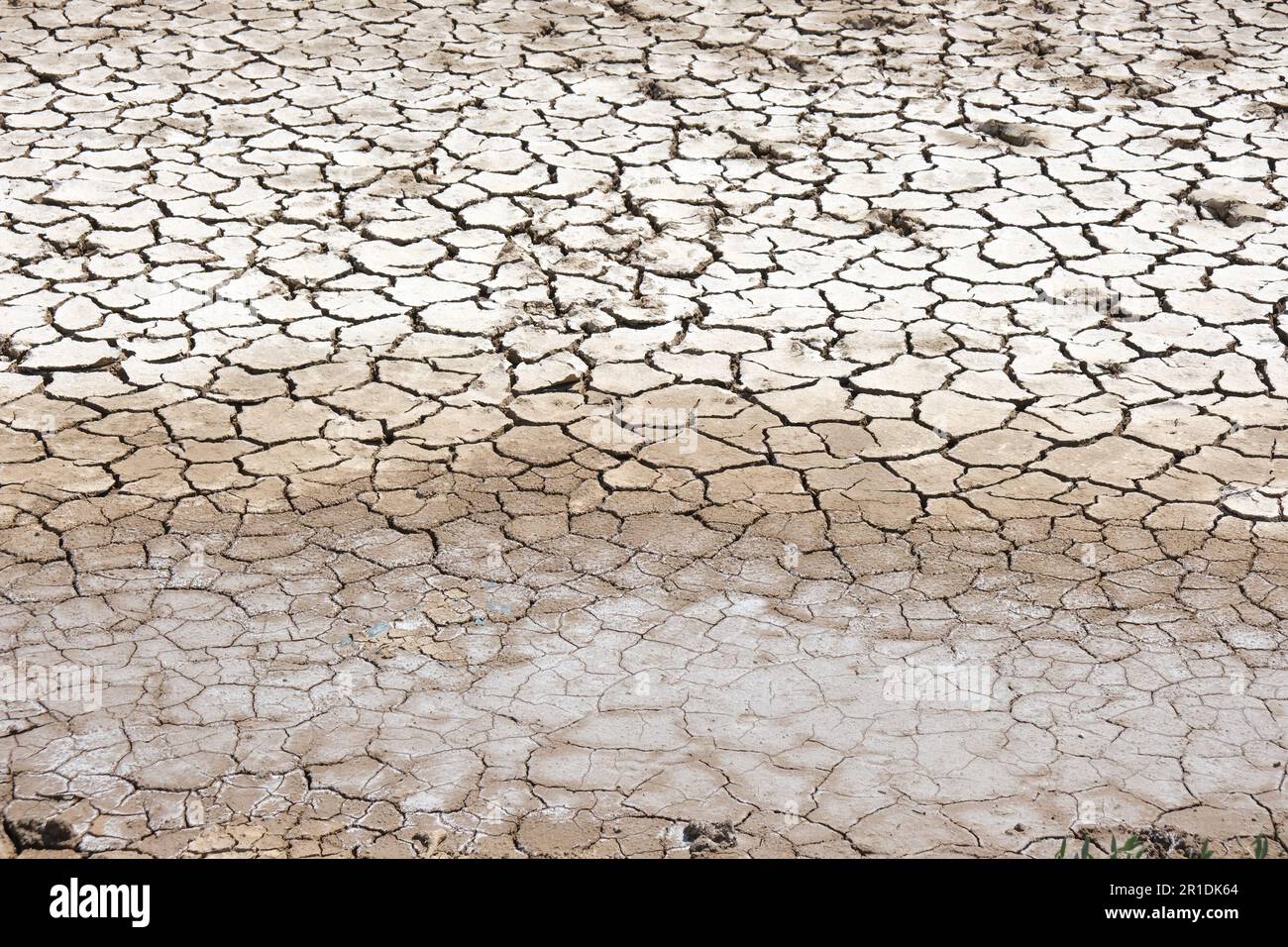 Drought, ground cracks, no hot water. Dry land in the dry season. Lack ...