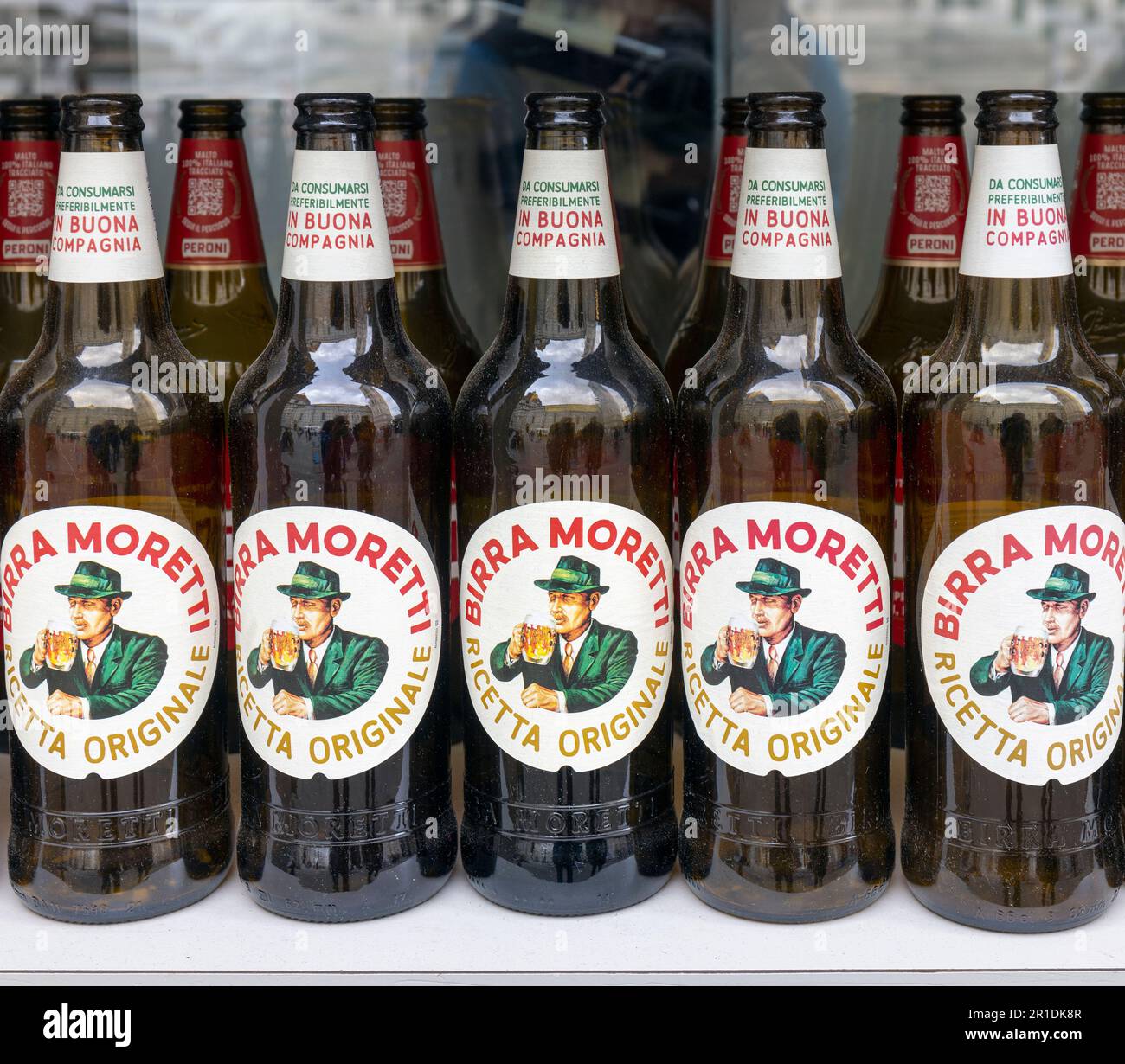 A display of bottles of Birra Moretti, a popular Italian beer. The ...