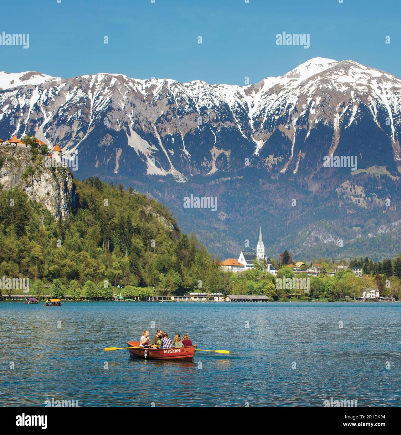Bled, Upper Carniola, Slovenia. Visitors enjoying a rowing excursion on ...