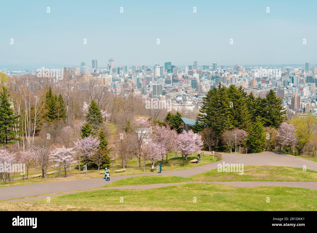 Panoramic view of Sapporo city and Asahiyama Memorial Park at spring in ...