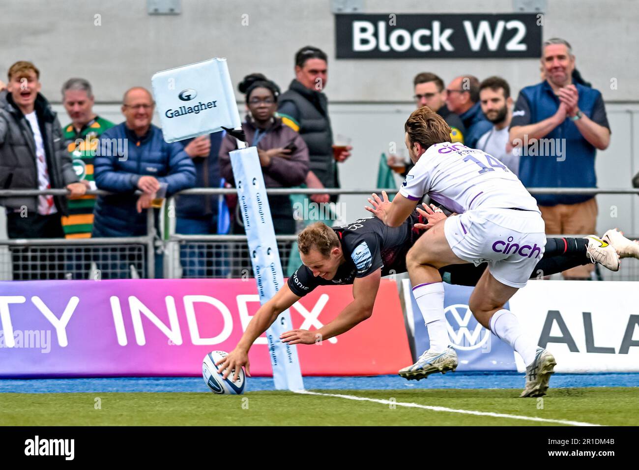 Max Malins of Saracens goes over the line to score the final try of ...