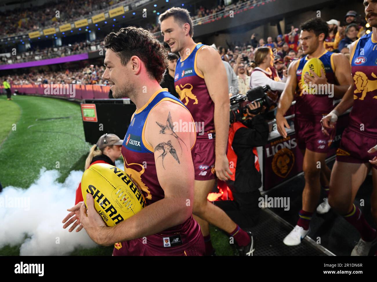 Tattoo’s are seen on the arm of Lachie Neale of the Lions during the AFL Round 9 match between ...