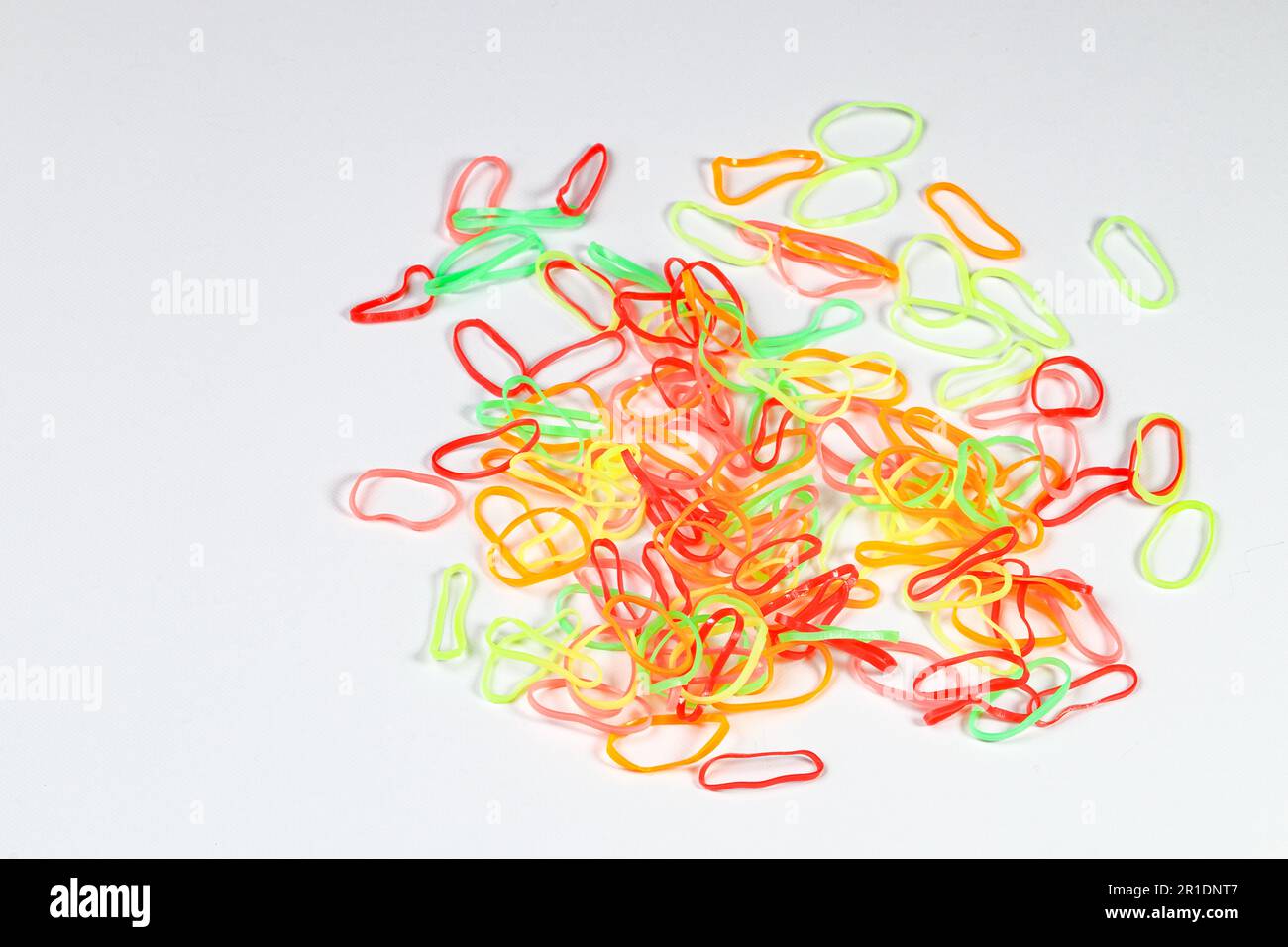 Pile of colorful, rainbow colors, multi colored elastic rubber bands on ...