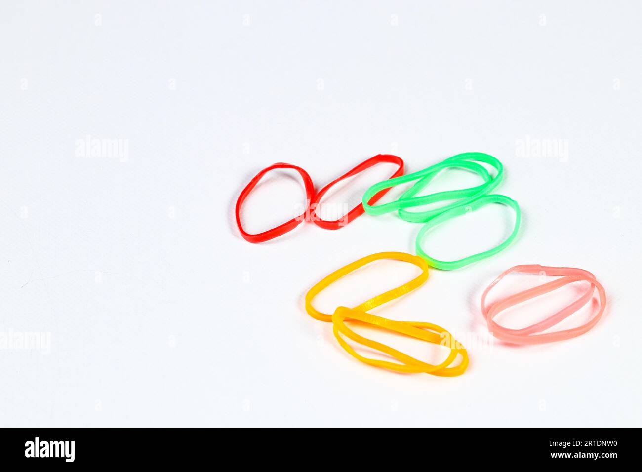 Pile of colorful, rainbow colors, multi colored elastic rubber bands on ...