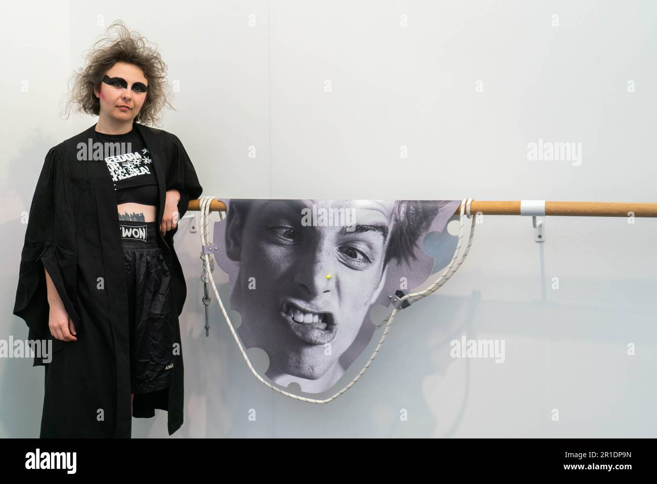 London UK. 13 May 2023. A visitor stands next to 'On The Nose' by ...