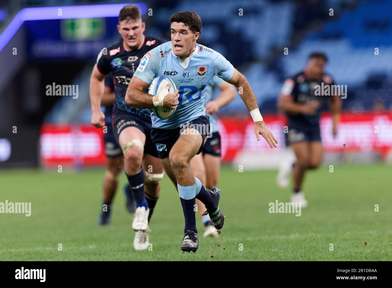 Sydney, Australia. 13th May, 2023. Ben Donaldson of the Waratahs runs ...