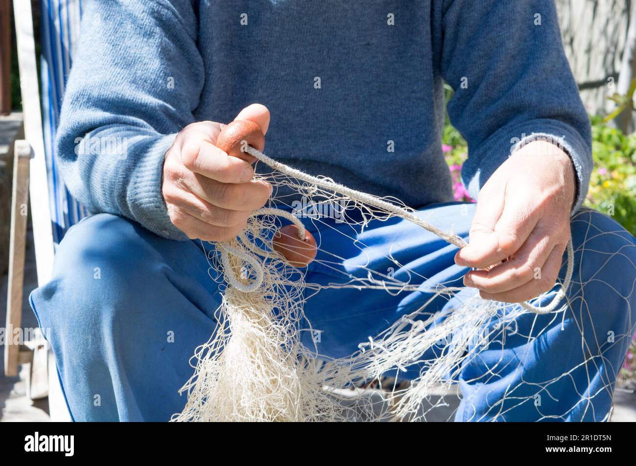 Old man fishing net from hi-res stock photography and images - Alamy