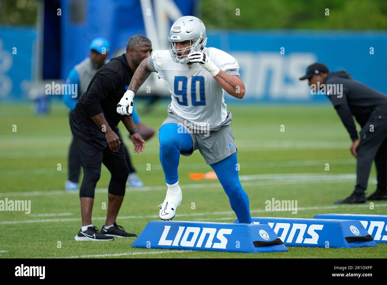 Detroit Lions defensive lineman Cory Durden runs a drill during an NFL football rookie minicamp ...