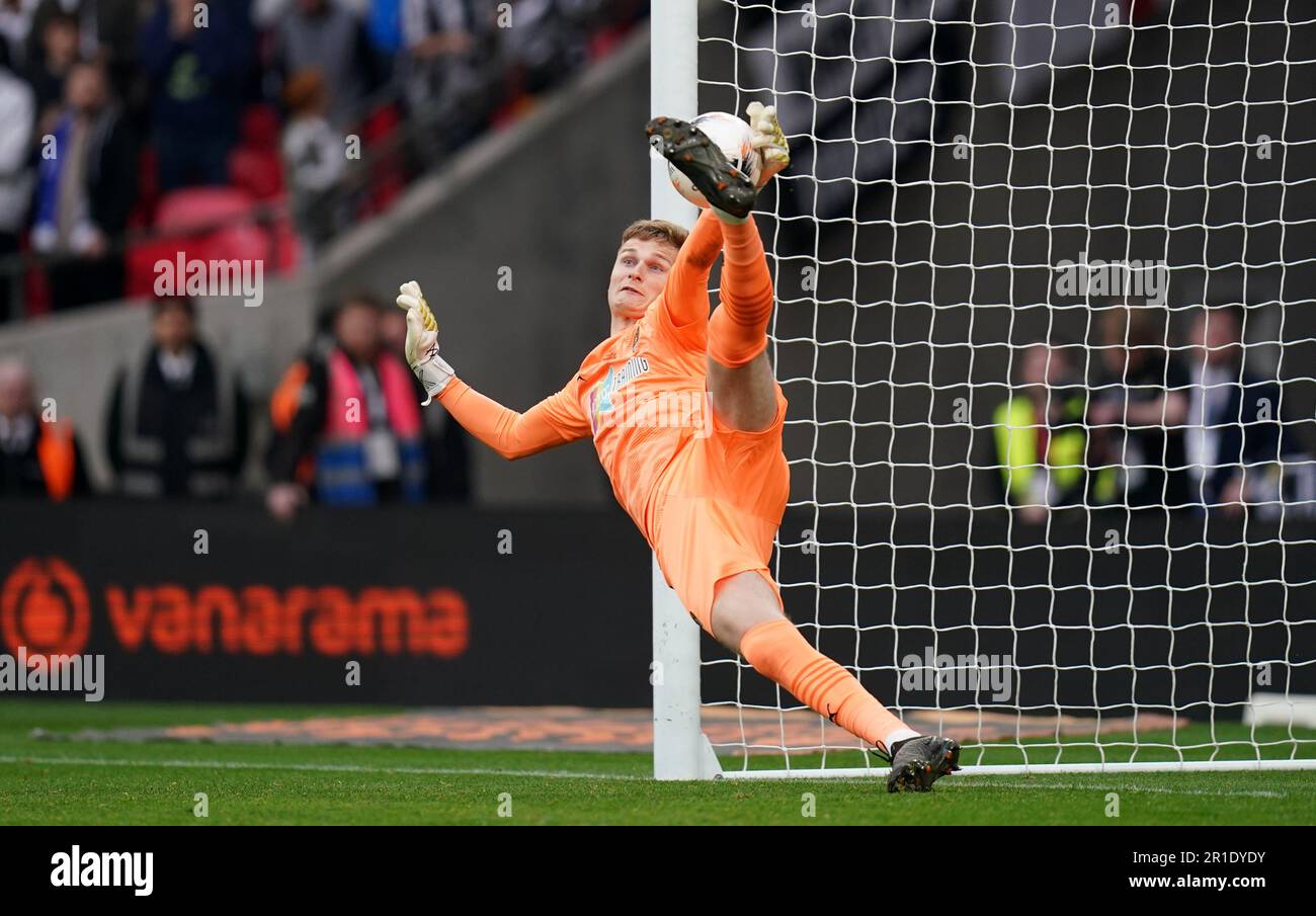 Notts County's Archie Mair makes a save in the penalty shoot-out during ...