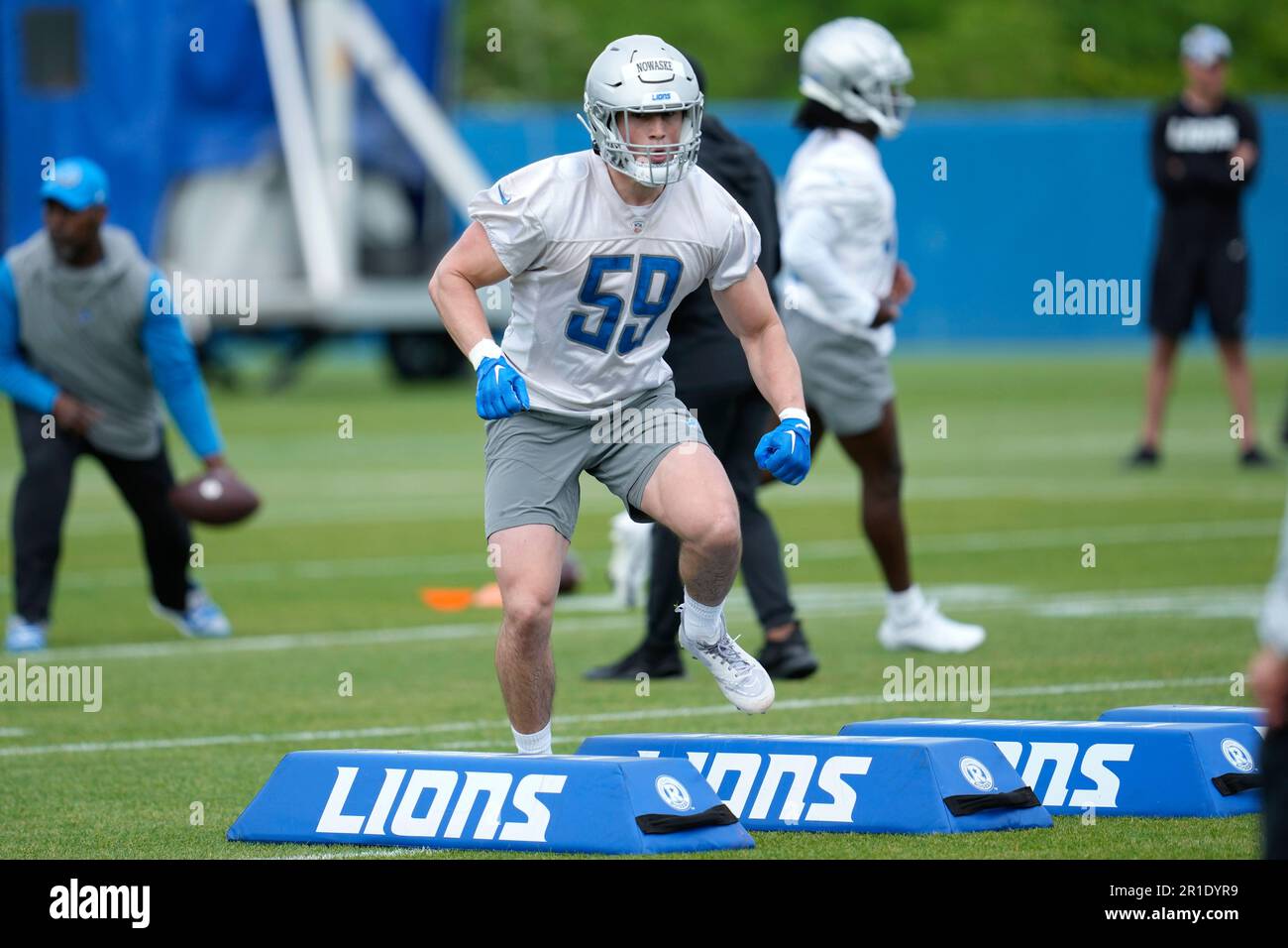 Detroit Lions linebacker Trevor Nowaske runs a drill during an NFL ...