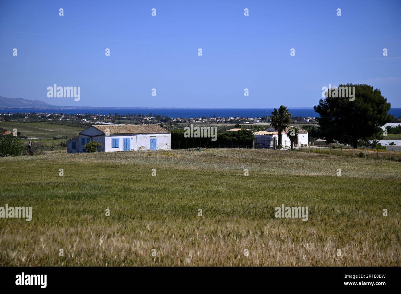 Rural landscape with scenic view of a traditional farmhouse overlooking ...