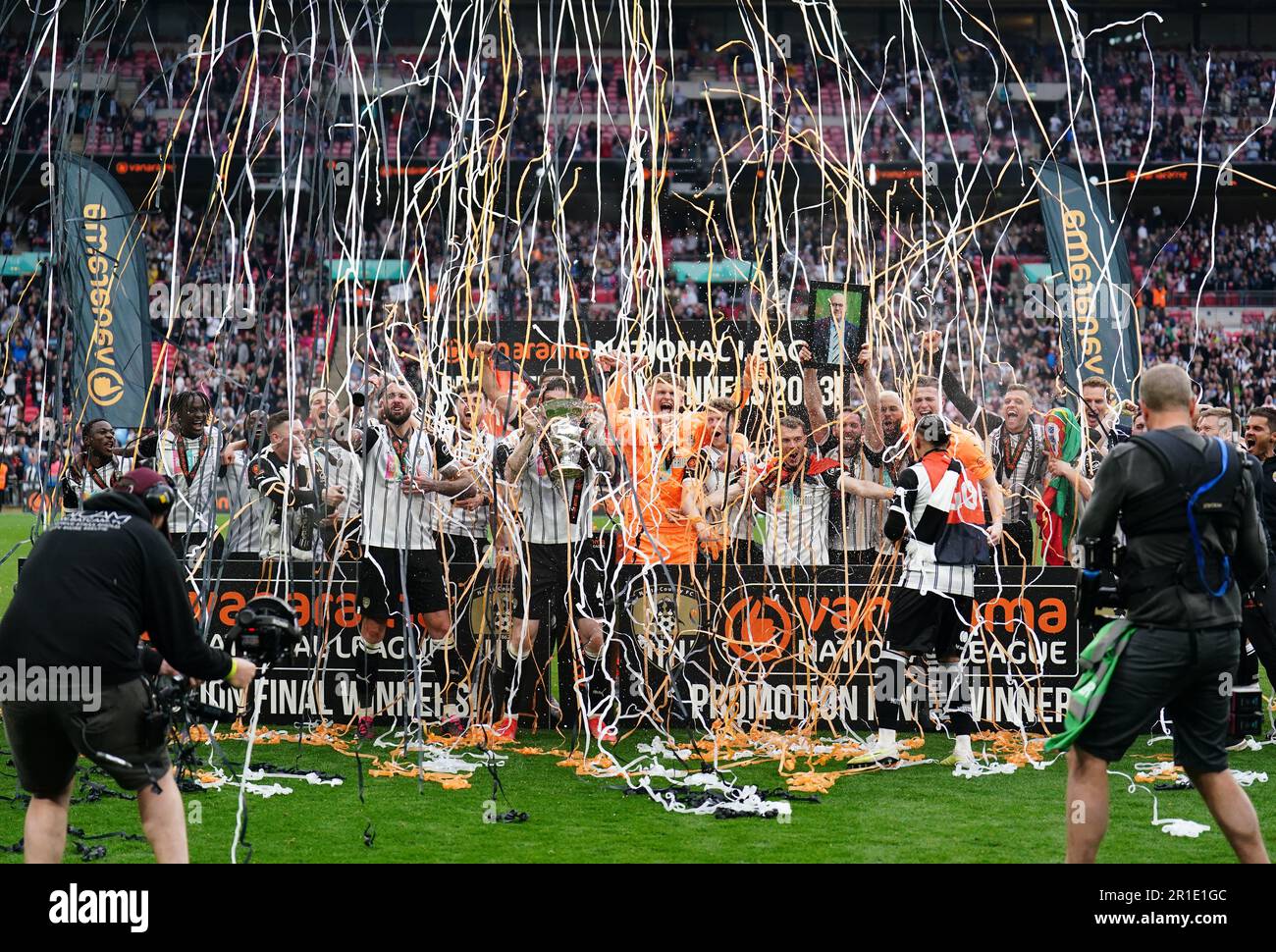 Notts County players celebrate promotion to the Sky Bet League Two with ...