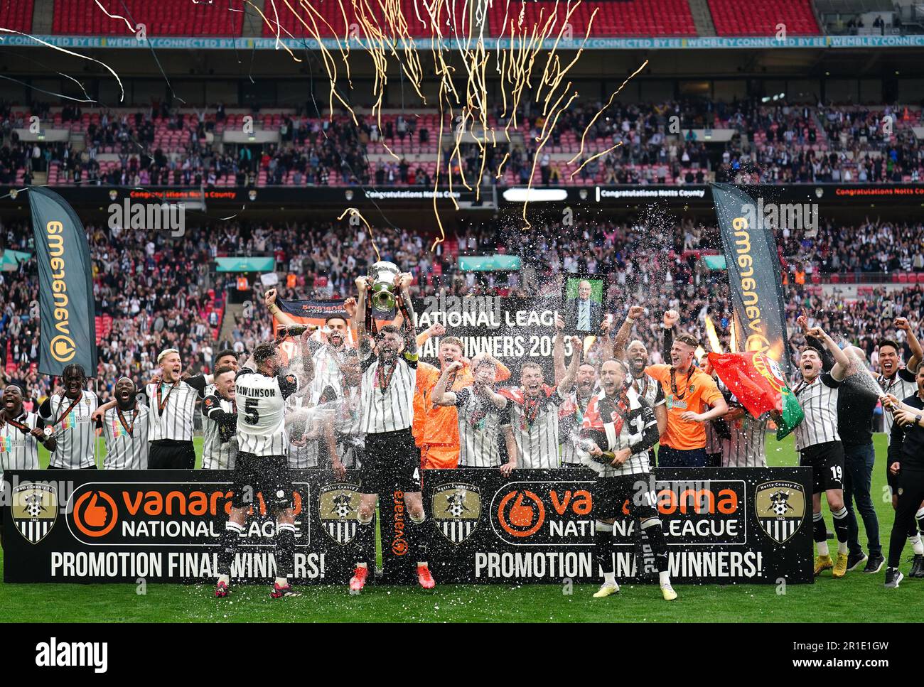 Notts County players celebrate promotion to the Sky Bet League Two with ...