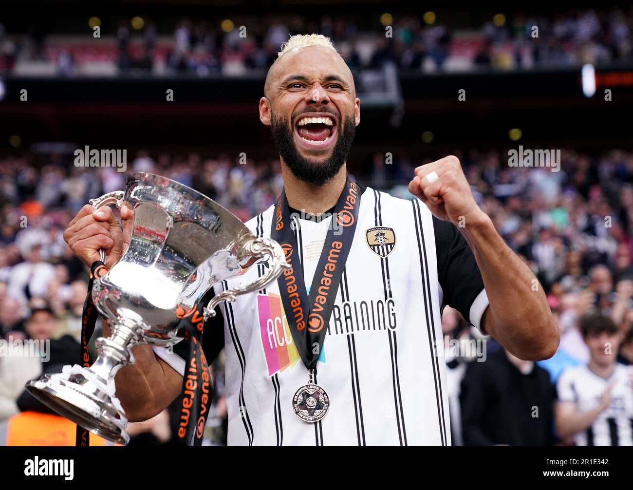 Notts County's John Bostock celebrates with the trophy after the ...