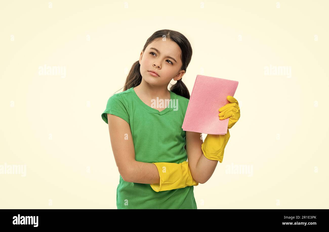 thoughtful girl cleaner do chores in studio. girl cleaner do chores on ...