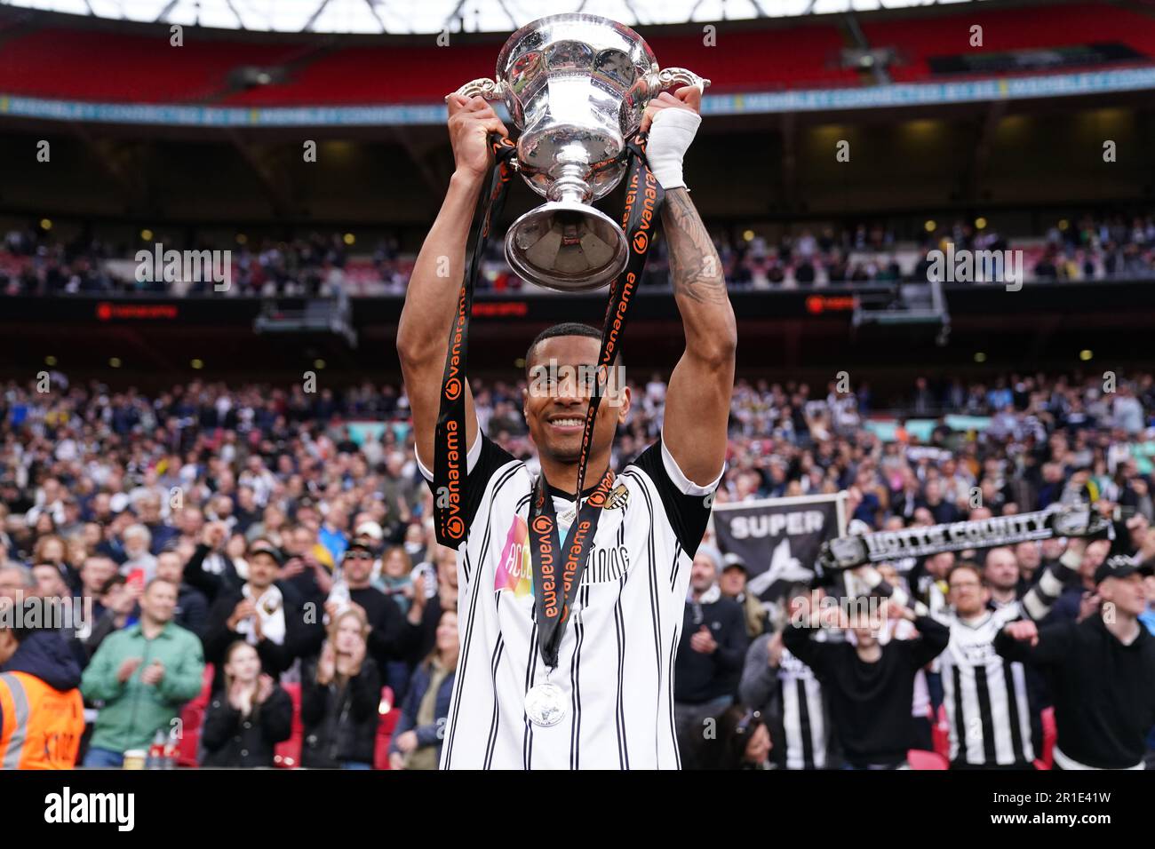 Notts County's Richard Brindley celebrates with the trophy after the ...