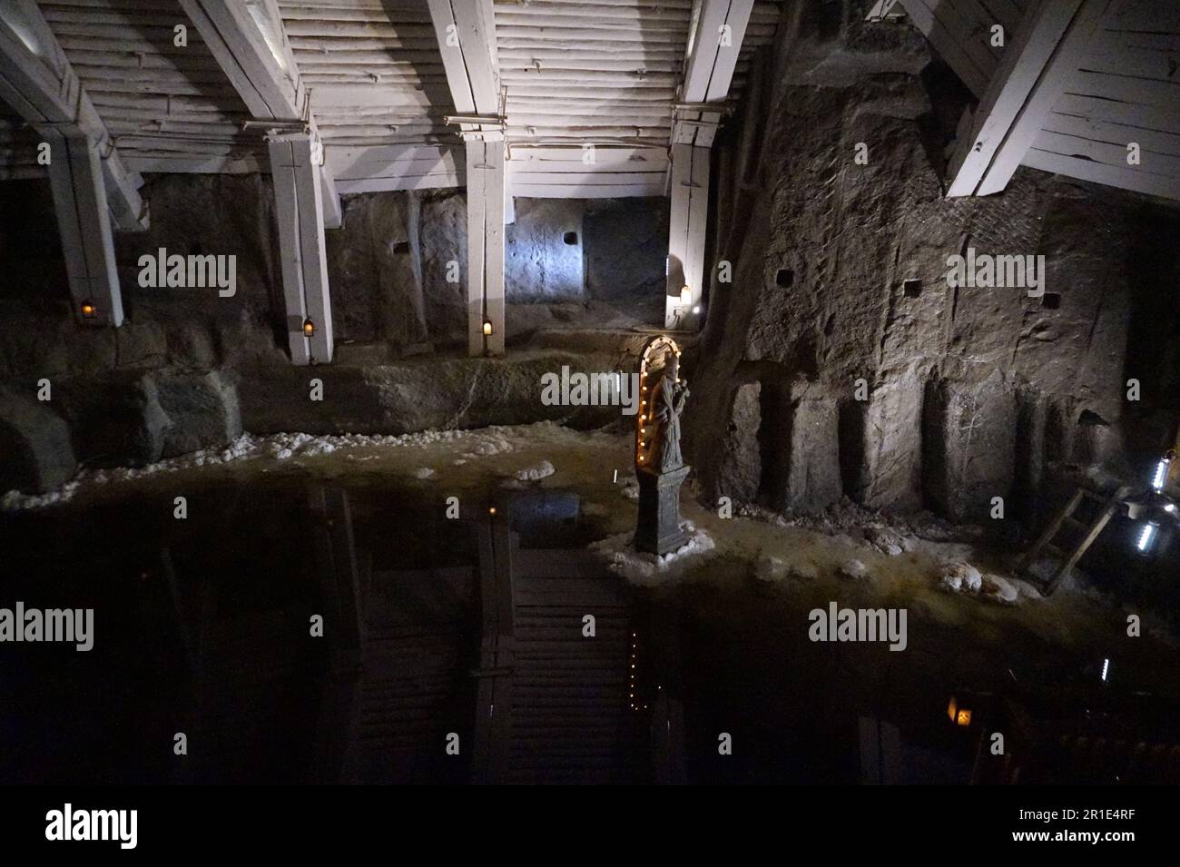 Statue of the Virgin Mary in a pool in Wieliczka Salt Mine, Krakow ...