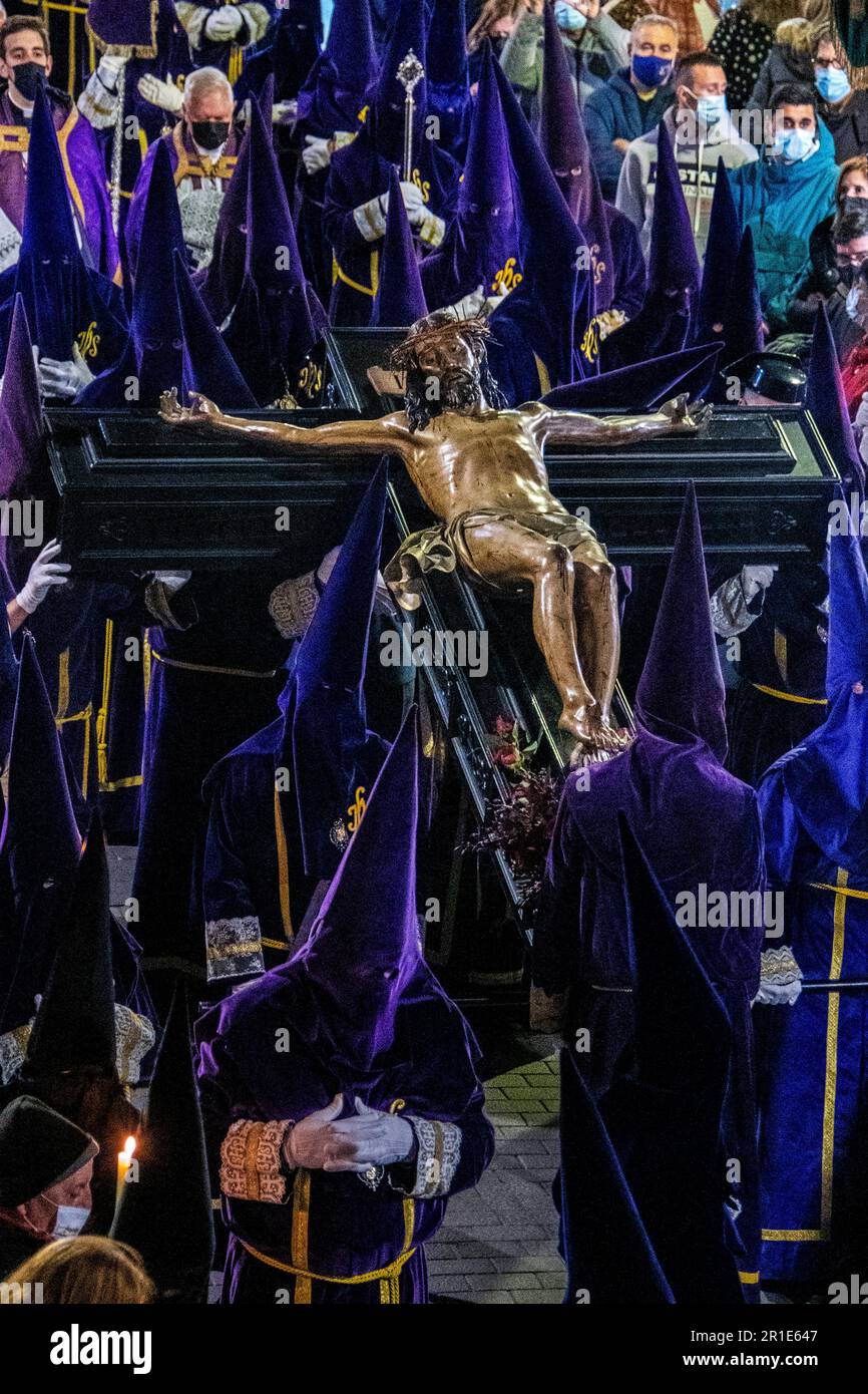 Members of the Cofradía P de Ntro Padre Jesús Nazareno carry the Paso ...
