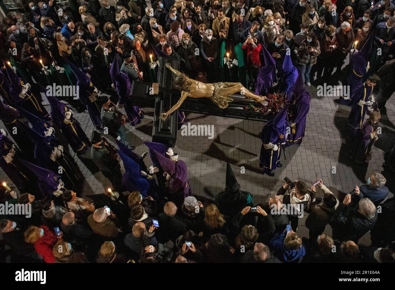 Members of the Cofradía P de Ntro Padre Jesús Nazareno carry the Paso ...