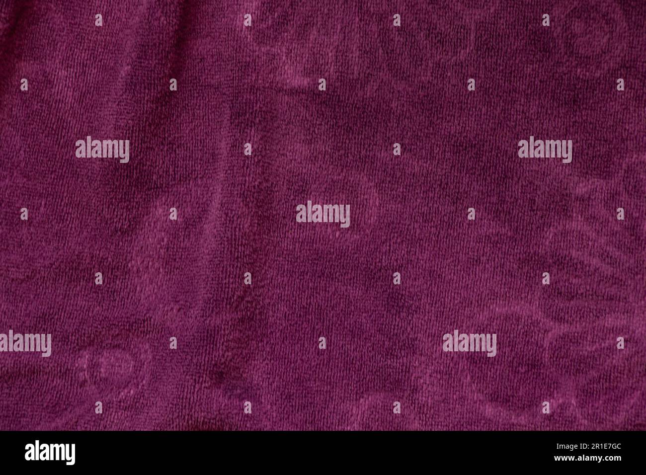 purple terry background in a fold close up Stock Photo - Alamy