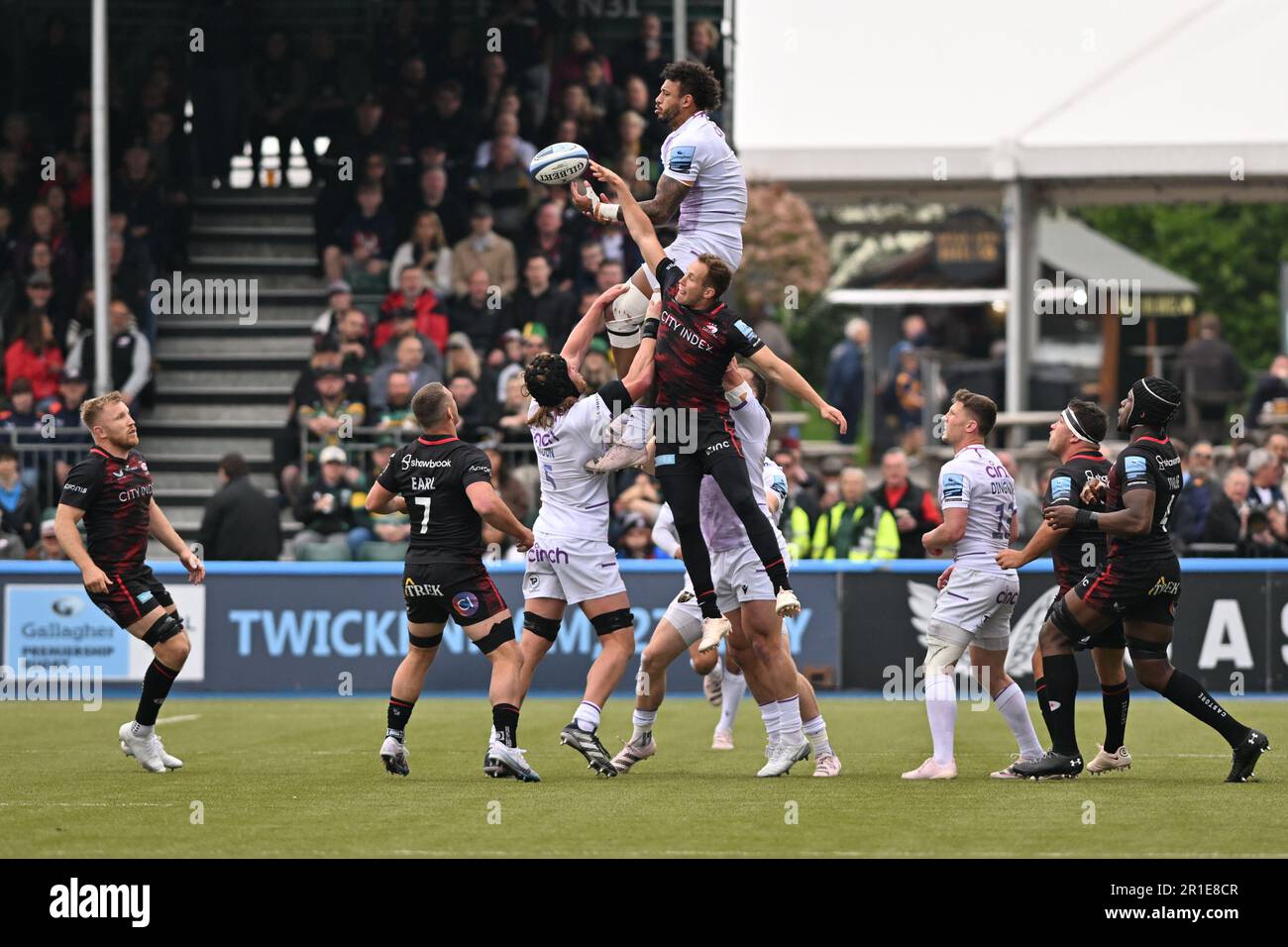 Nick Isiekwe of Saracens and Courtney Lawes of Northampton Saints ...