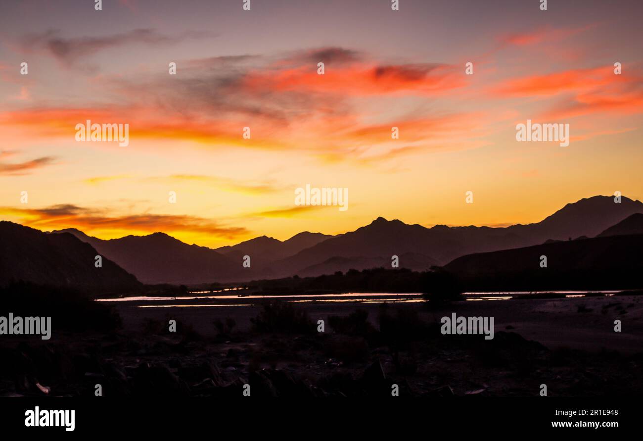 Dramatic Sunset over the distant mountains of the Richtersveld Stock ...