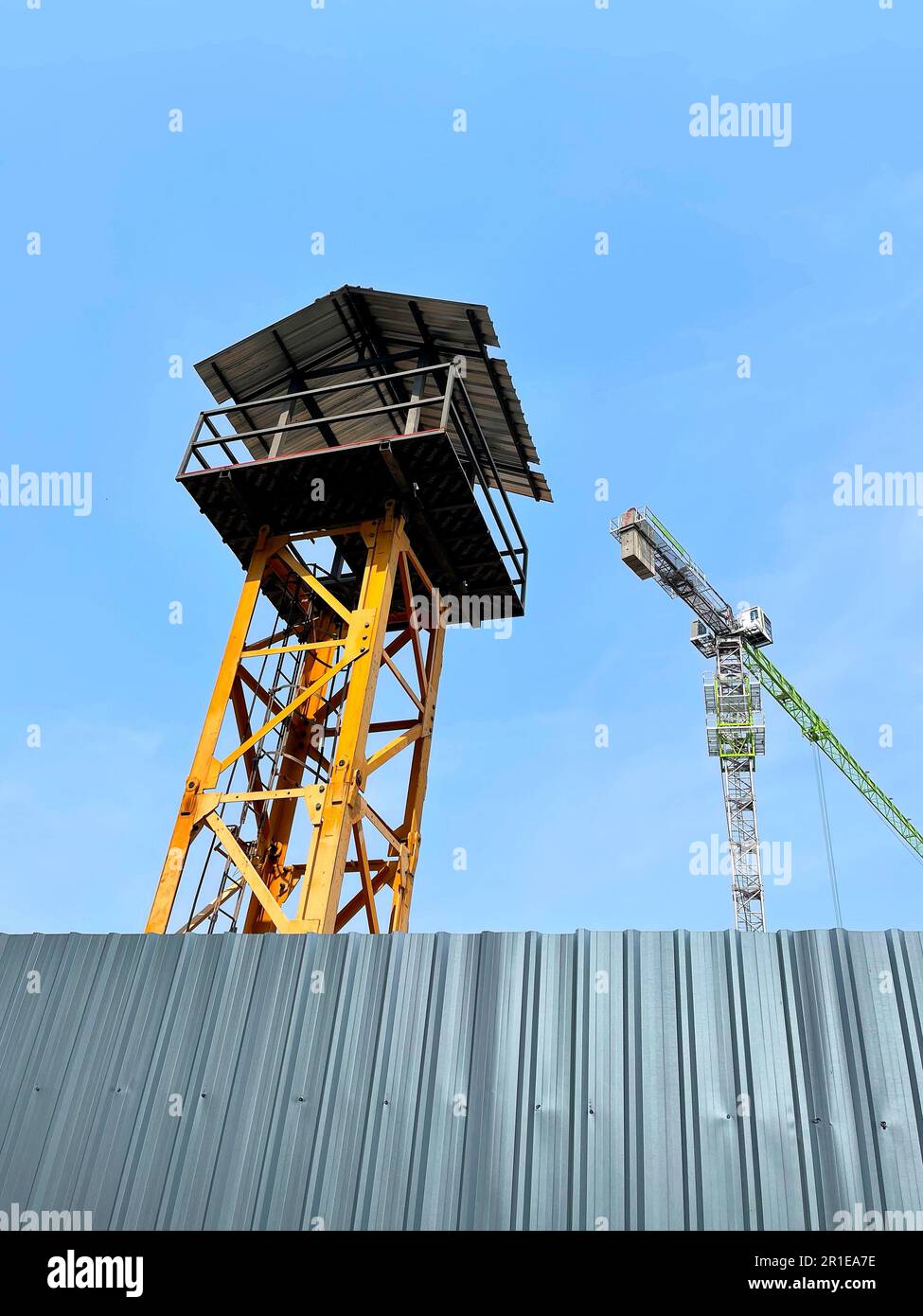 Watch tower or observation tower in construction site, background with ...