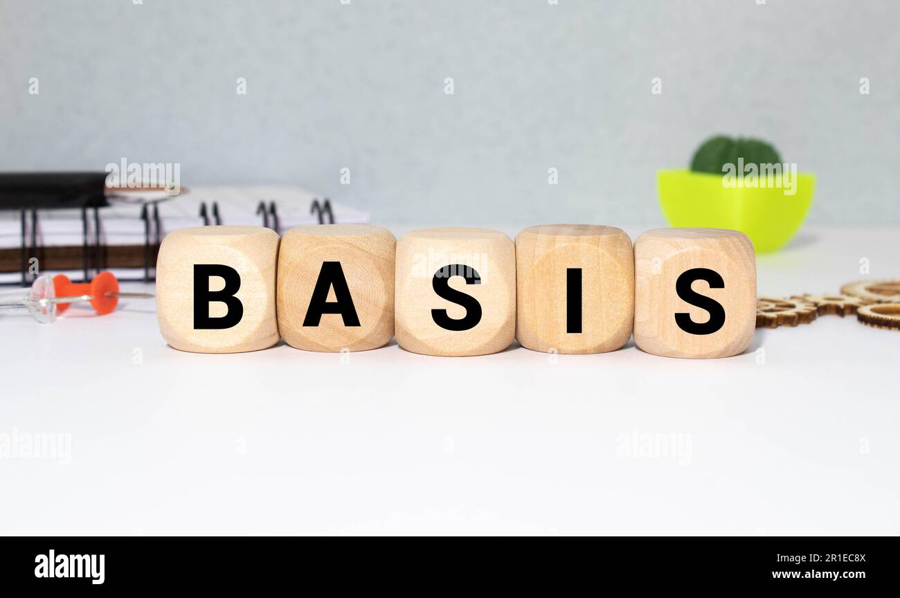 White tile alphabet letter with word basis on wood background Stock ...