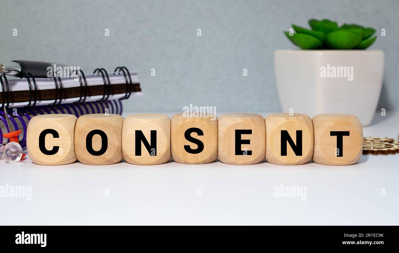 Consent - word from wooden blocks with letters, consent concept, on ...