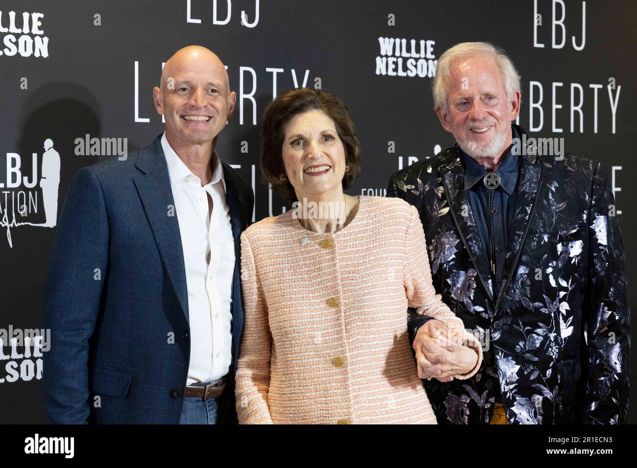 LBJ School director JR DESHAZO, l, poses with LYNDA ROBB and friend JOE ...