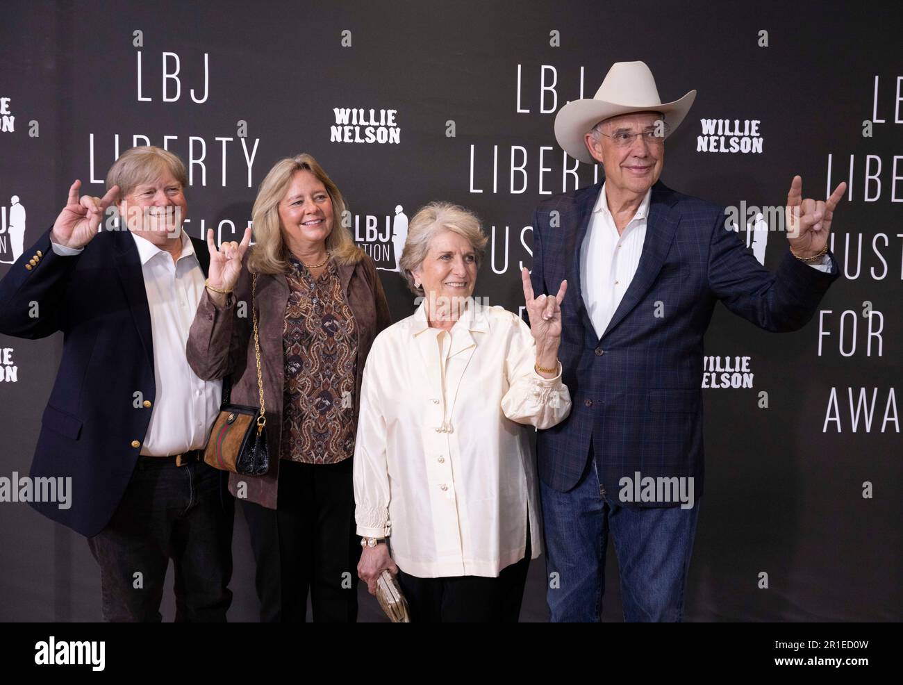 Left to right DAVID SAATHOFF, CONNIE SAATHOFF, ISABELLA CUNNINGHAM and WILLIAM CUNNINGHAM pose ...